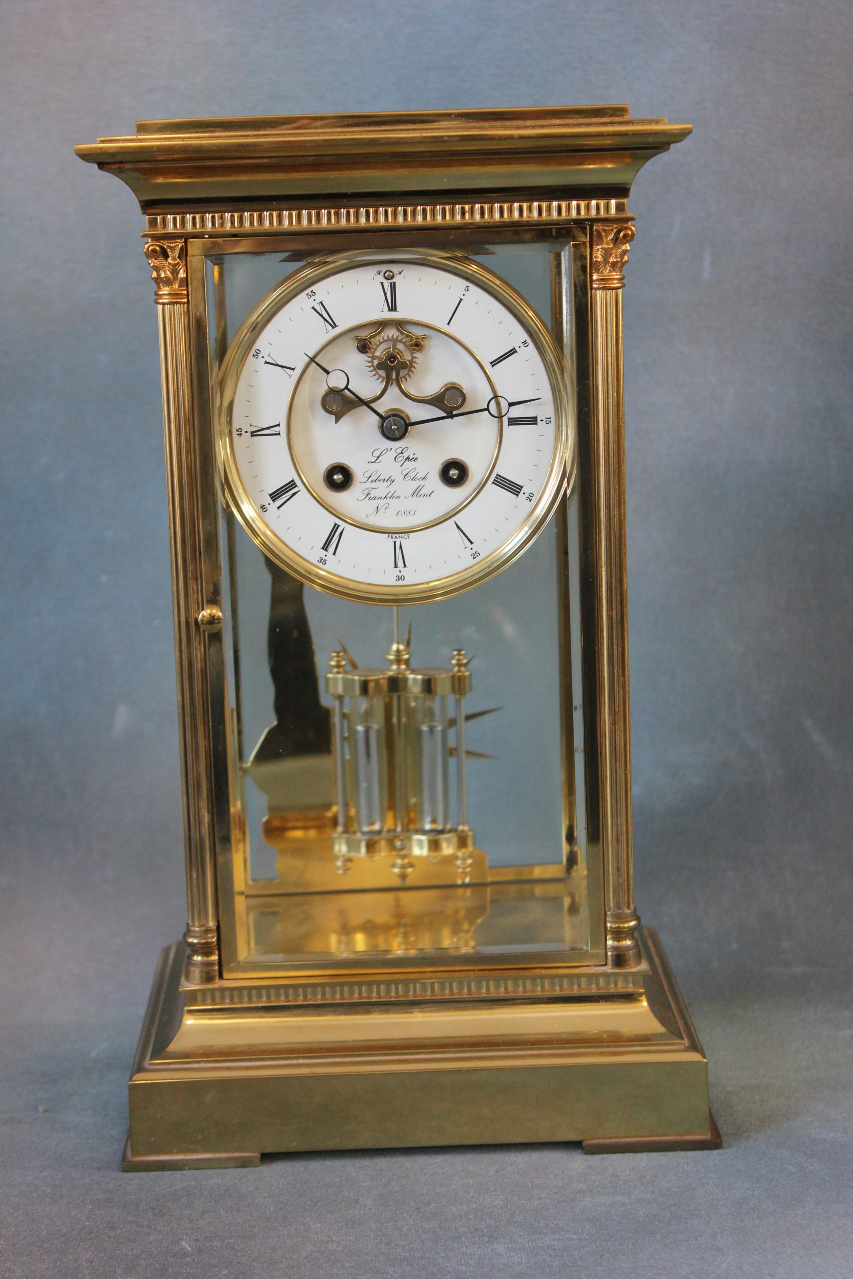 A Gilt Brass Liberty Clock. – Ibbett Mosely Auctions